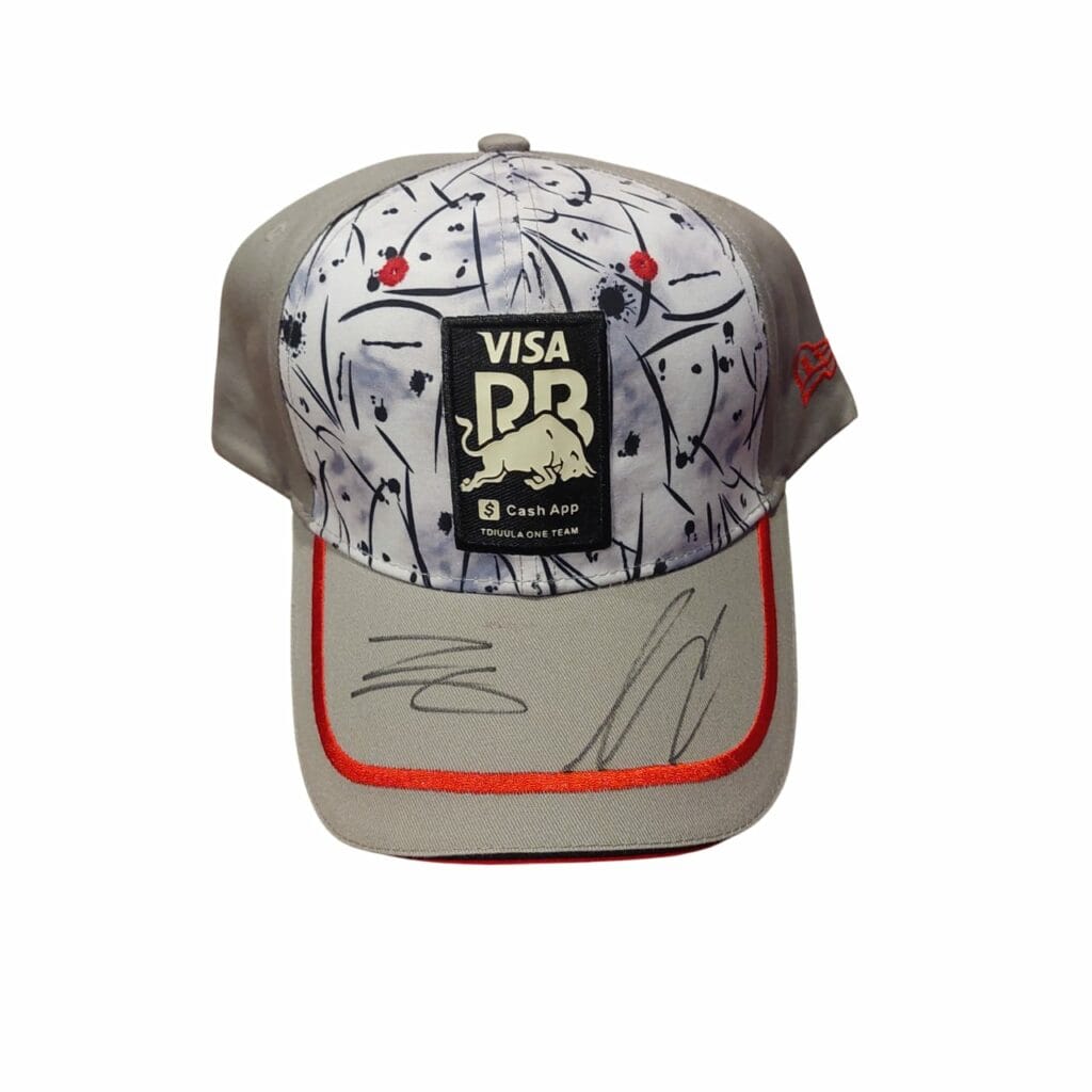 ISACK HADJAR AND LIAM LAWSON SIGNED F1 CAP - Grandstand Memorabilia